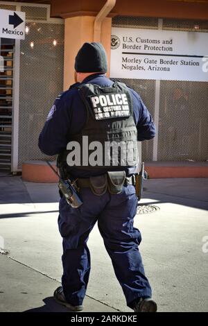 A U.S. Customs and Border Protection agent in an A-Star helicopter ...