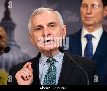 U.S. Senator Jack Reed (D-RI) speaking with U.S. Senator Tim Kaine (D ...