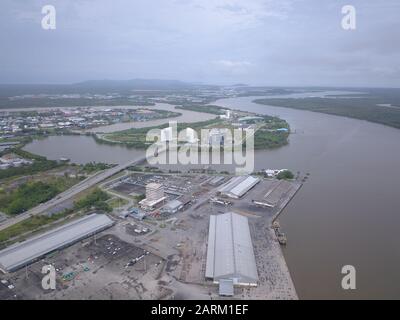 Aerial view of a barrage at the Kuching Isthmus island, with ships ...