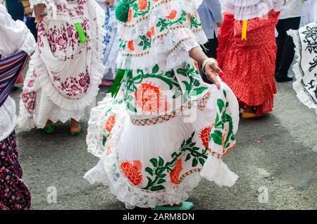 Details of the typical Panamanian dress known as pollera. The pattern is all handmade using ...