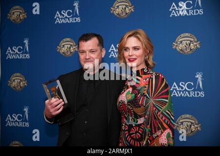 (L-R) Colin Watkinson and actor Emily Deschanel attends the 34th Annual ...