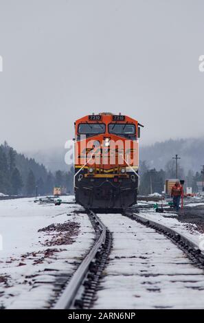 A Burlington Northern BNSF Railroad switchman on the tracks in the town ...