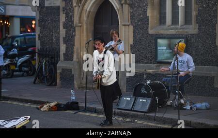The Big Push band performing in Ship Street Brighton in winter sunshine ...