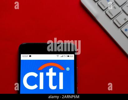 In this photo illustration, a Citibank logo seen displayed on a ...