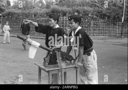 A car with a heavy machine gun on the roof. Machine gun for shooting at ...