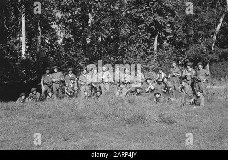 Dutch military unit, partly in camouflage uniform,, poses for a group ...