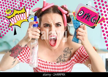 Funny angry housewife cleaning kitchen window Stock Photo - Alamy