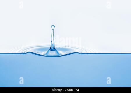 drop created splash with circle ripple Stock Photo - Alamy
