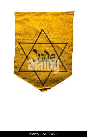 German Jewish badge showing yellow star saying Jude Stock Photo - Alamy