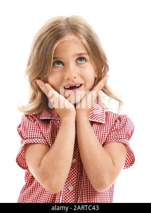 Portrait of flattered little girl on color background Stock Photo - Alamy