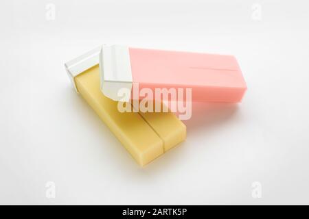 Liposoluble wax cartridges on white background Stock Photo - Alamy