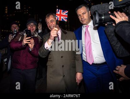 Nigel Farage leaves the European Parliament in Brussels, Belgium, for ...