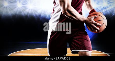 Composite image of basketball player Stock Photo - Alamy