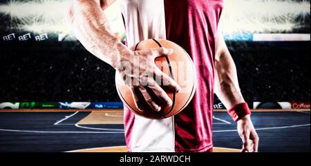 Composite image of basketball player Stock Photo - Alamy