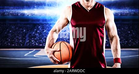 Composite image of basketball player Stock Photo - Alamy