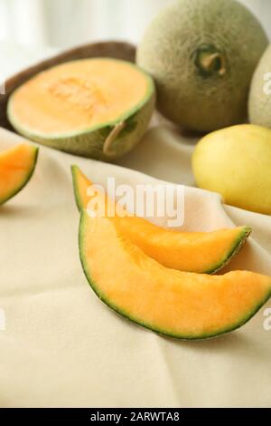 Sweet cut melon on table, closeup Stock Photo - Alamy