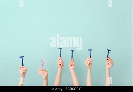 Hands with different accessories for shaving on white background Stock ...