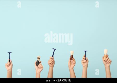 Hands with different tools for shaving on white background Stock Photo ...