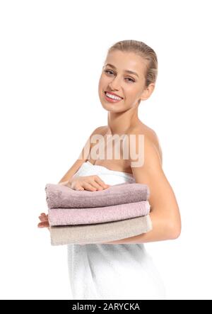 Woman holding stack of clean soft towels at home Stock Photo - Alamy