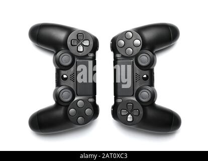 Modern game pads on light blue background with space for text Stock ...