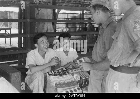 A Dutch soldier at a toko Date: 1946 Location: Indonesia, Dutch East ...
