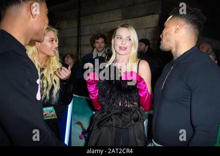 Jordan Hames, Margot Robbie and Michael Griffiths attending the world ...