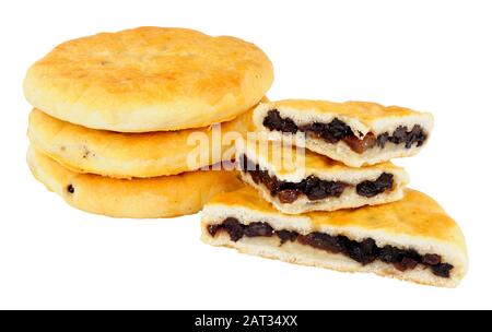 Traditional raisin filled Lancashire Chorley cakes isolated on a white ...