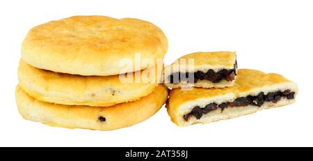 Traditional raisin filled Lancashire Chorley cakes isolated on a white ...