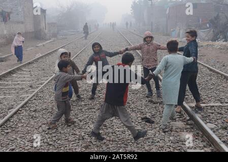Pakistani poor children playing near river Ravi ahead of International ...