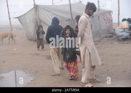 Homeless children playing on the streets in Angola Stock Photo - Alamy