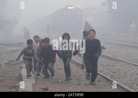 Pakistani poor children playing near river Ravi ahead of International ...