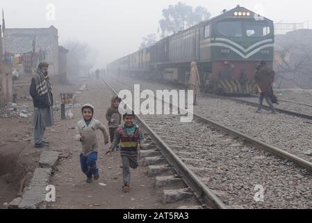 Pakistani poor children playing near river Ravi ahead of International ...