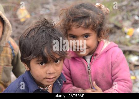 Pakistani children playing on the streets of Burnley Lancashire Stock ...