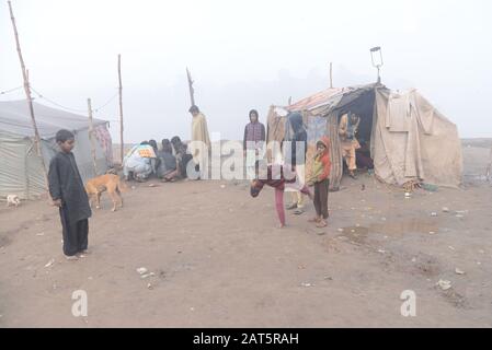 Pakistani poor children playing near river Ravi ahead of International ...
