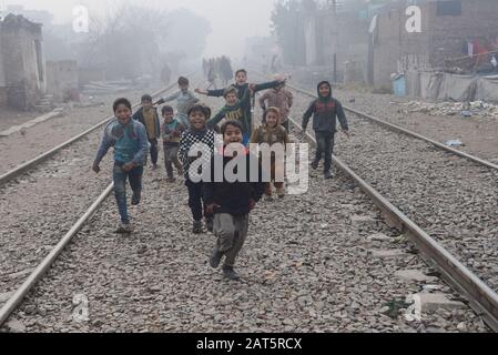 Pakistani poor children playing near river Ravi ahead of International ...