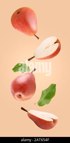 Creative concept with flying pear isolated on green Stock Photo - Alamy