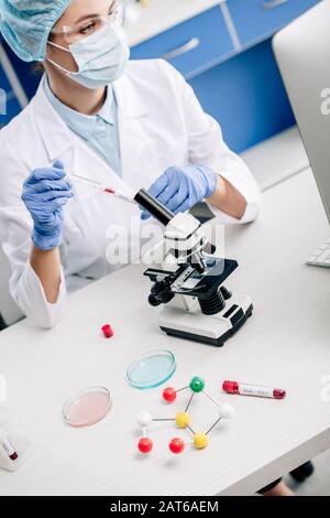 cropped view of genetic consultant doing dna test in lab Stock Photo ...
