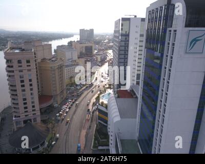 Aerial view of the Kuching city area, with the rivers, bridges, hills ...