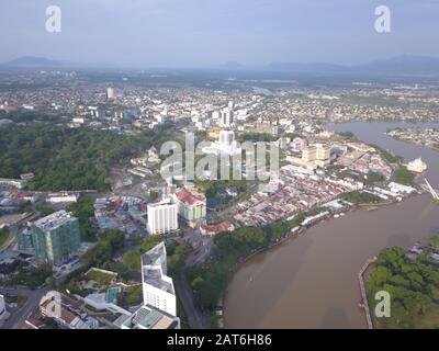 Aerial view of the Kuching city area, with the rivers, bridges, hills ...