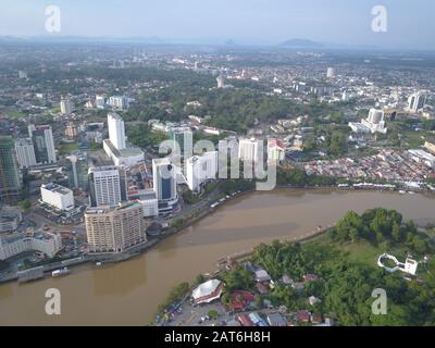 Aerial view of the Kuching city area, with the rivers, bridges, hills ...