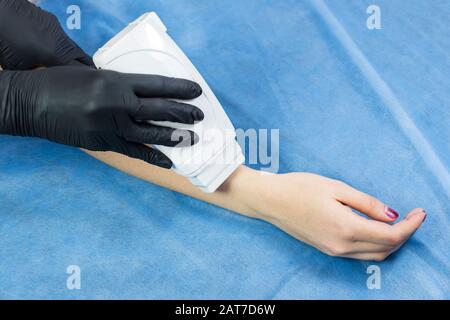 Depilation of female body parts in a beauty salon Stock Photo - Alamy