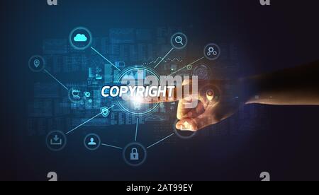 Hand touching COPYRIGHT inscription, Cybersecurity concept Stock Photo ...
