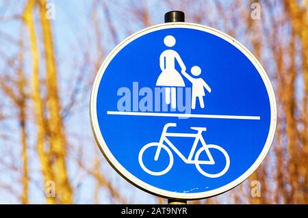 German Sign Sidewalk With Bike Path. Blue Background With Pedestrian ...