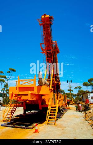 Exploration core drilling with RC drill rig fitted with dust ...