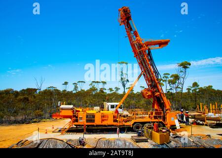 Exploration core drilling with RC drill rig fitted with dust ...
