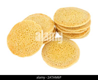 Tradition thin pikelet flat crumpets isolated on a white background ...