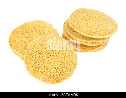 Tradition thin pikelet flat crumpets isolated on a white background ...