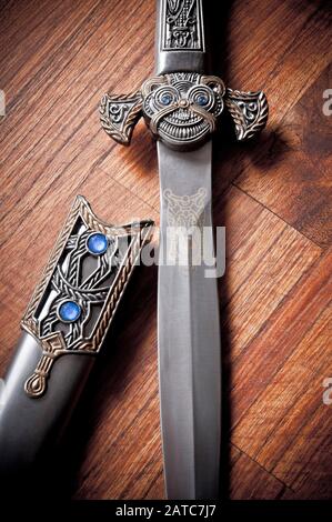 Viking dagger with decorated handle Stock Photo - Alamy