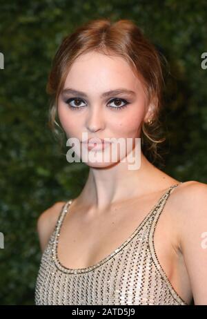 Lily-Rose Depp arriving at the Charles Finch and Chanel pre-Bafta party ...