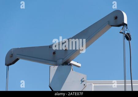 A window cleaning hoist on the top of a research institute Stock Photo ...